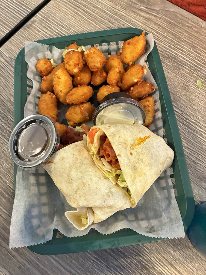 When a wrap and cheese curds share a plate, it's not just lunch—it's a Midwest collaboration that deserves a standing ovation.