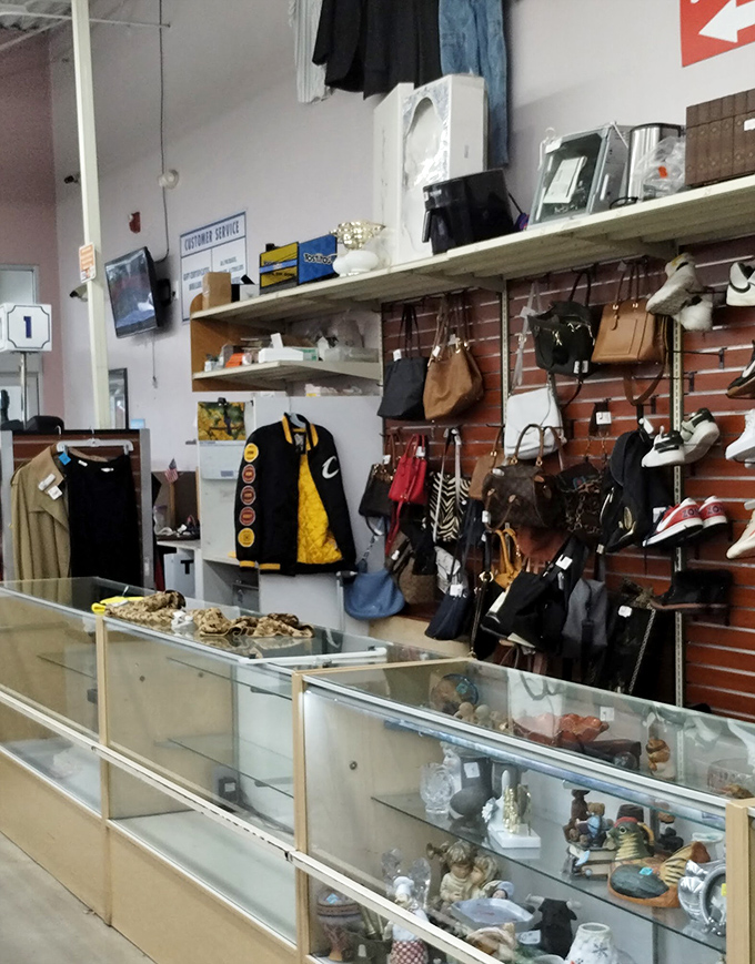 The accessories section &ndash; a museum of practical art where vintage handbags and barely-worn heels await their next adventure.