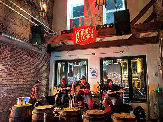 Where local musicians turn whiskey-soaked evenings into memories. Those barrel tables have heard more stories than most bartenders in this town.