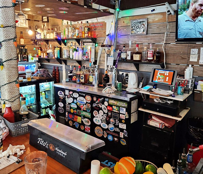 A bar adorned with enough stickers to document a lifetime of coastal adventures &ndash; each one representing someone who couldn't resist leaving their mark.