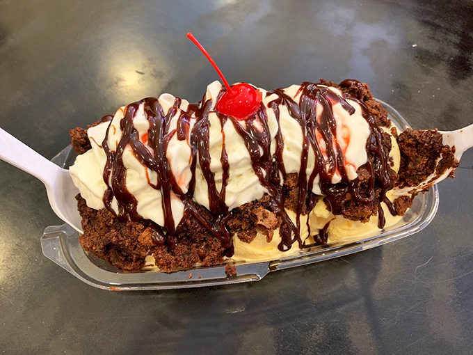 Not all sundaes wear capes, but this one deserves superhero status. The hot fudge cascades down vanilla peaks like delicious lava from Mount Dessert.