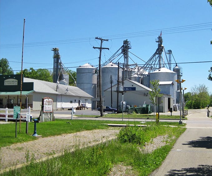 Those grain silos stand like industrial sentinels, reminding visitors that beneath the collegiate charm beats an agricultural heart.