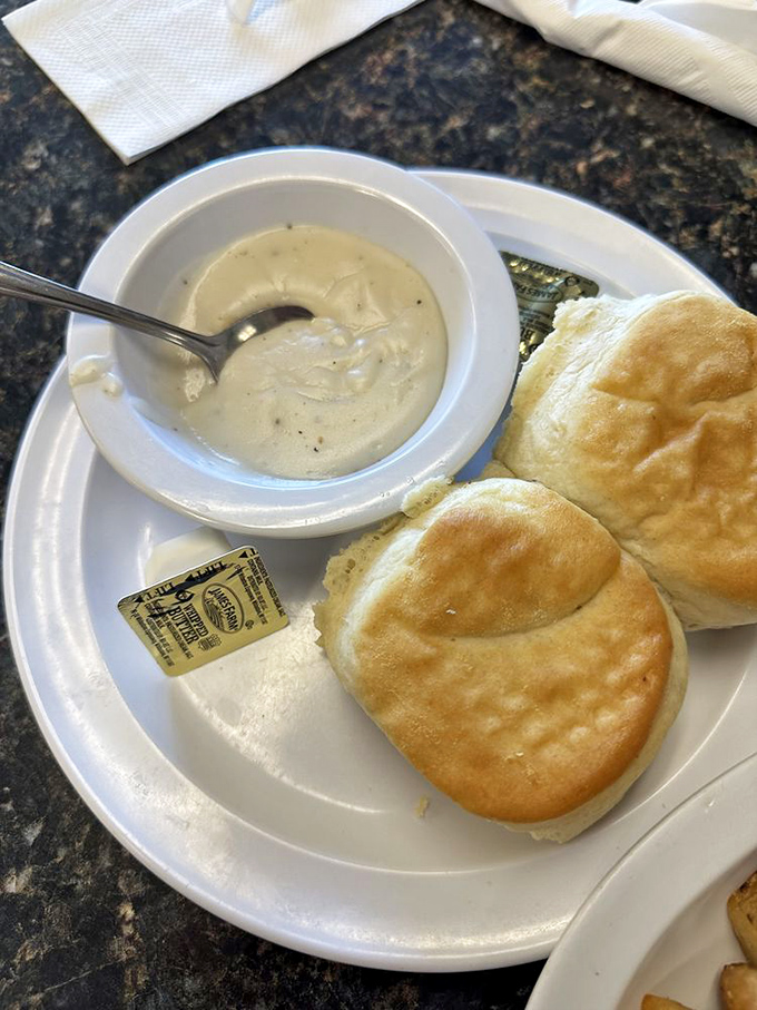 Biscuits that could make your grandmother jealous, paired with gravy that should be declared a state treasure.