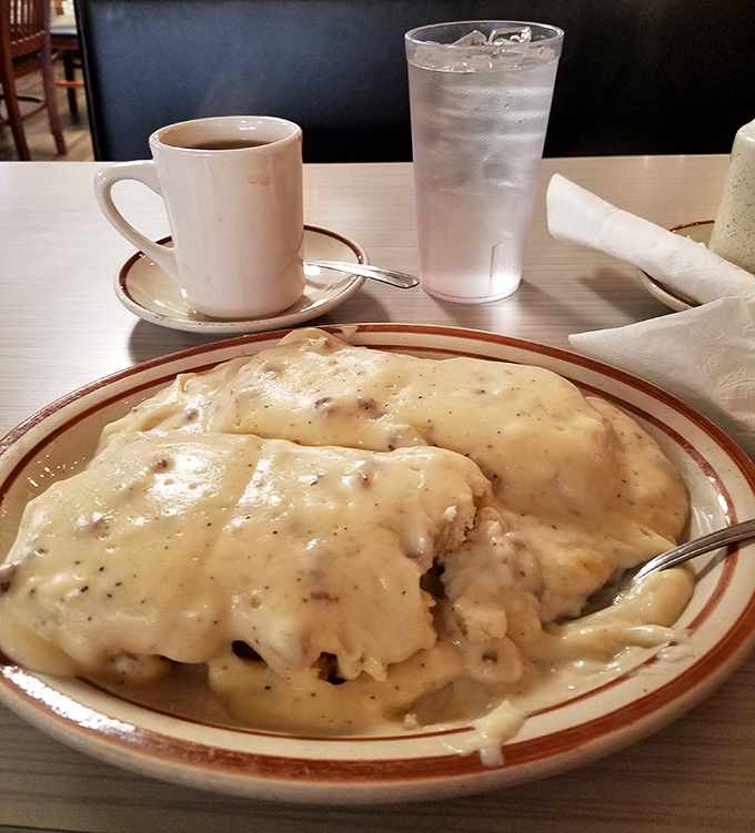 Biscuits and gravy&mdash;the Southern breakfast that hugs you from the inside. This plate doesn't just feed you; it adopts you.