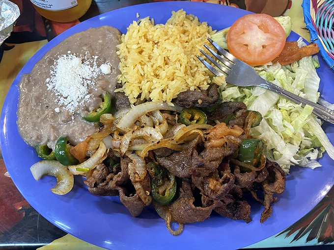 A blue plate special that's anything but ordinary. The sizzling meat and peppers are having a party, and your taste buds are invited.