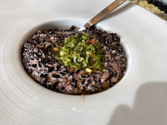 Black rice and oxtail that looks like it belongs in a food photographer's portfolio. Comfort food gets a sophisticated makeover that still hugs your soul.