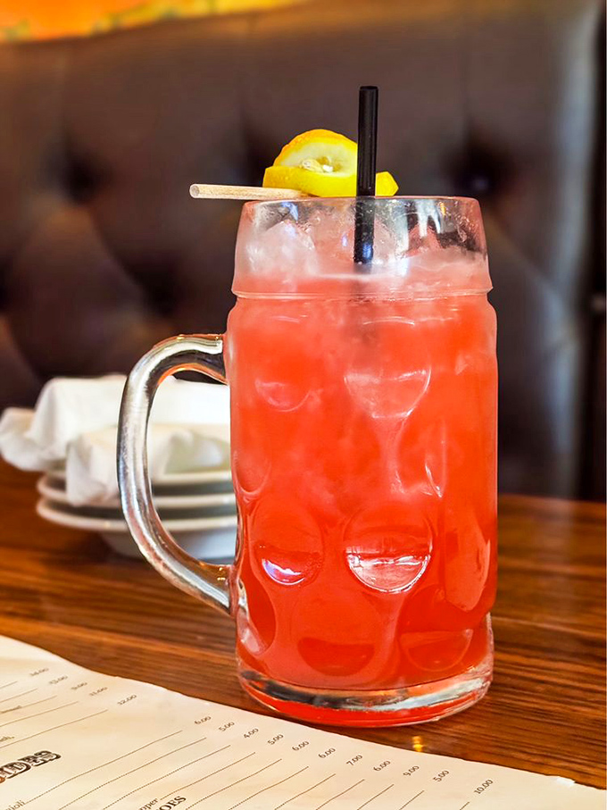 The Blackberry Lemonade cocktail brings together summer nostalgia and adult privileges in one dangerously sippable mason jar.