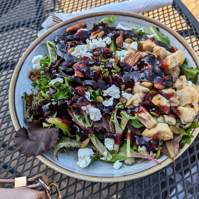 Garden party meets Wisconsin dairy pride. This blackberry salad with cheese crumbles proves vegetables can indeed play nicely with dessert ingredients.
