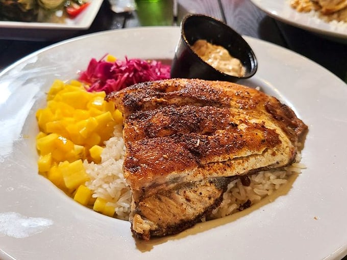 Blackened fish done so perfectly it makes you wonder if the chef has a direct hotline to the spice gods of New Orleans.