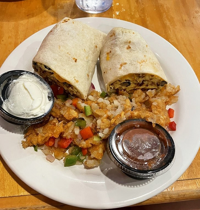 Breakfast burritos: where morning ingredients find their higher purpose, wrapped in a tortilla and served with crispy potatoes for good measure.