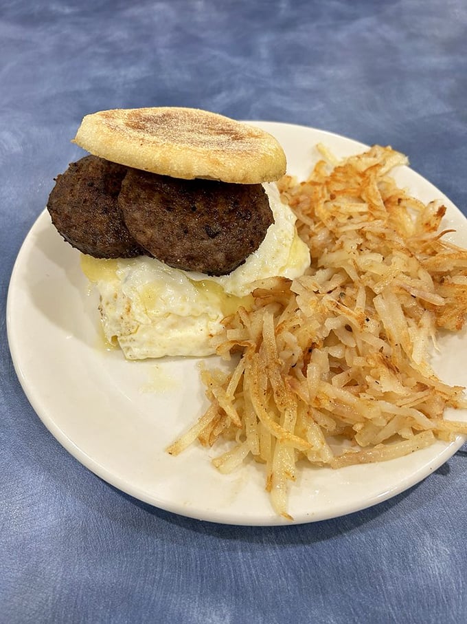 Breakfast goes handheld with this English muffin masterpiece. Sausage patties and egg create the morning equivalent of a power couple.