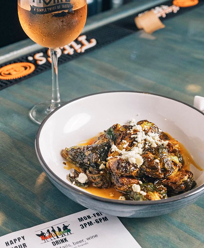 Brussels sprouts that could convert even the most dedicated vegetable skeptic—caramelized, cheese-topped, and utterly irresistible.