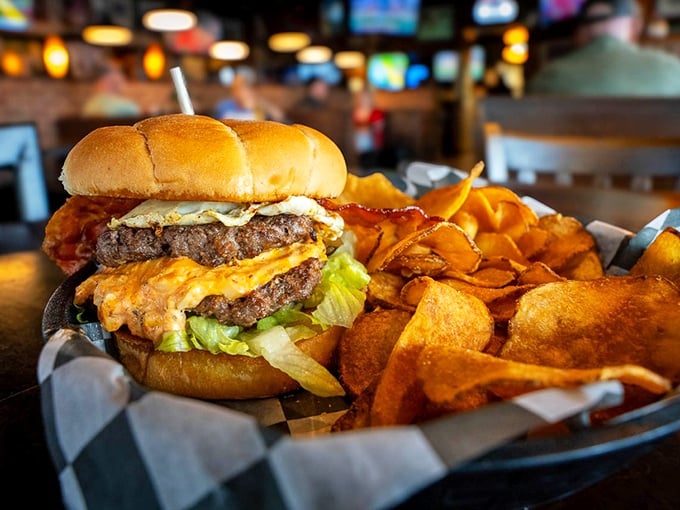 Burger architecture at its finest. Those house-made chips aren't sidekicks—they're co-stars in this delicious production of "Lunch: The Musical."