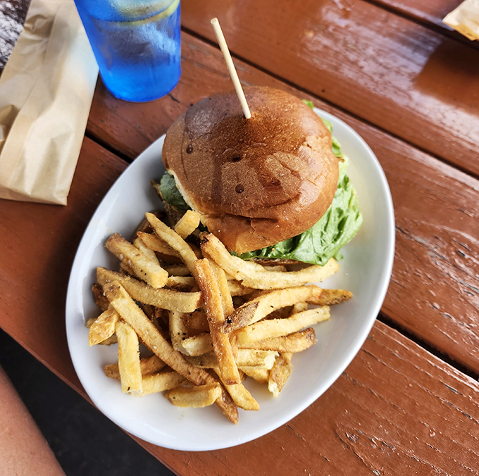 A burger sporting the Underdog logo branded right onto the bun&mdash;because when your food tastes this good, you put your stamp on it.