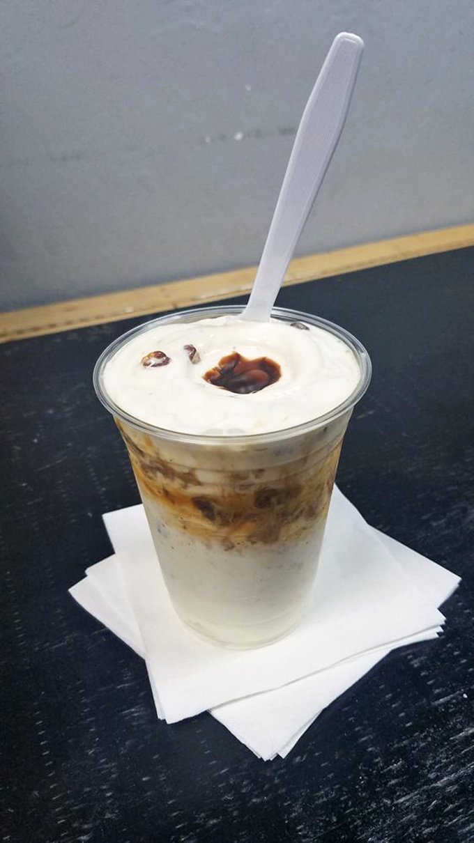 Butter pecan custard with a hot fudge well&mdash;proof that whoever designed this understands that life's greatest pleasures involve strategic chocolate distribution.