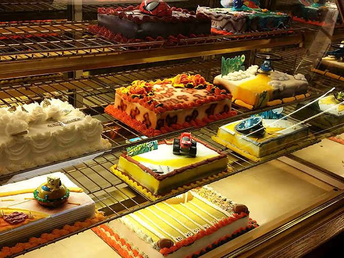 Life's celebrations, preserved in buttercream and fondant. The bakery case offers sweet endings to complement those savory beginnings.