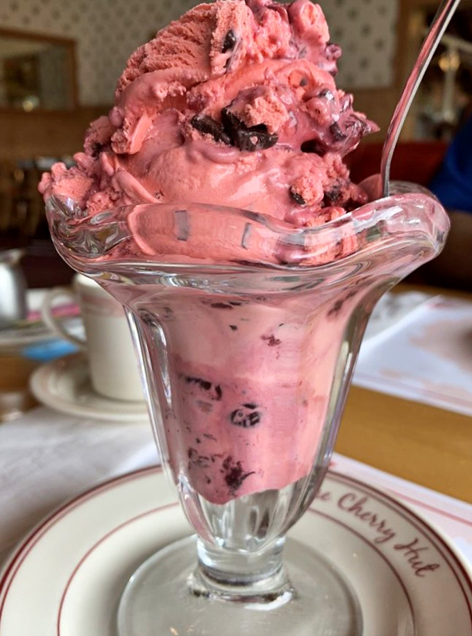 Cherry ice cream so vibrantly pink it looks like it could power a small city. Chunks of real cherries serve as delicious little reminders of why you came.