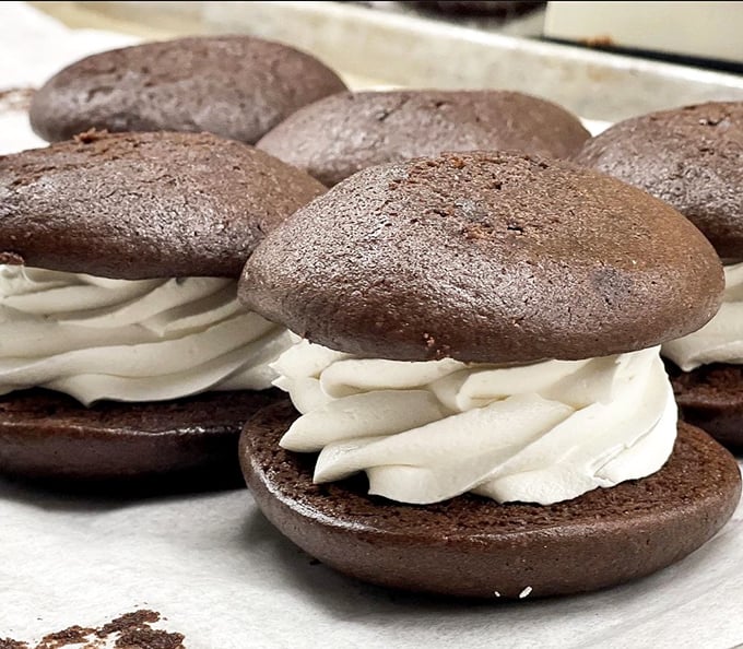 Chocolate whoopie pies with cream filling so perfect they make you understand why some people develop emotional relationships with dessert.