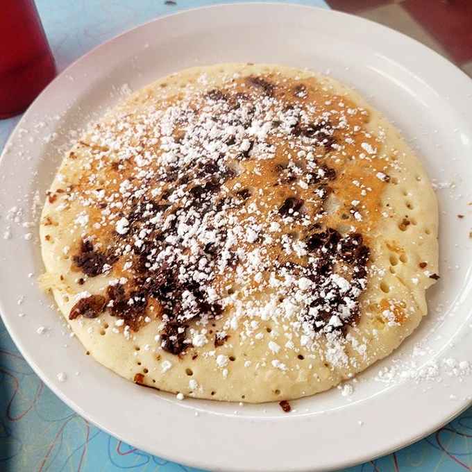 This chocolate chip pancake has achieved the perfect chip-to-cake ratio that mathematicians have been trying to calculate since the dawn of breakfast.
