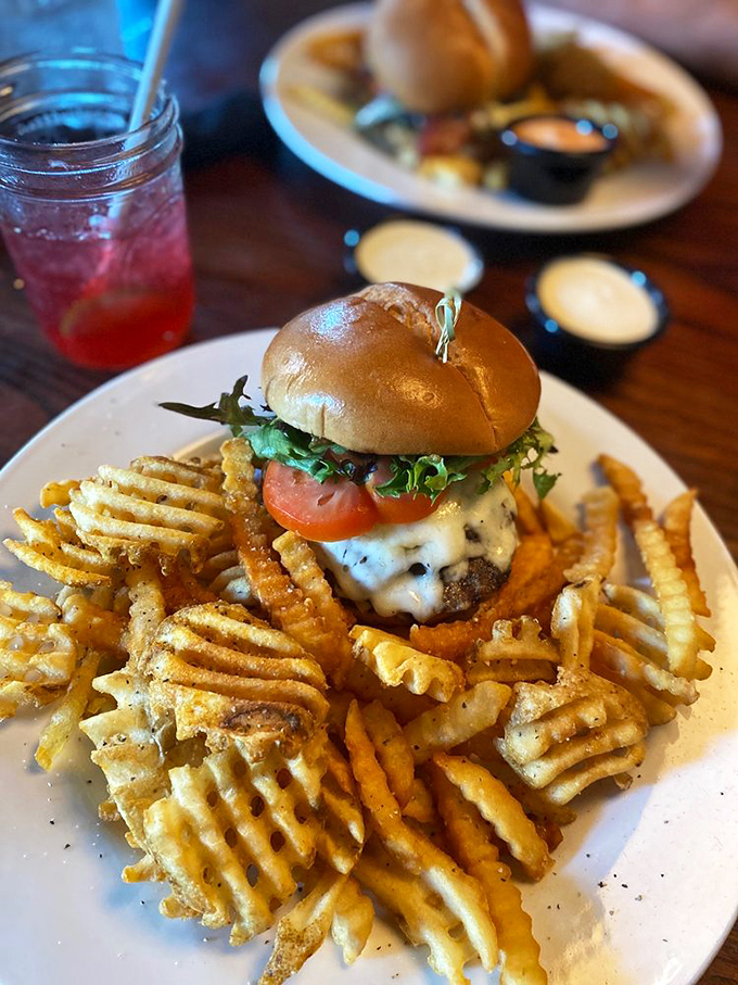 The burger that launched a thousand road trips. Notice how the cheese drapes perfectly over the patty like a warm, dairy blanket.