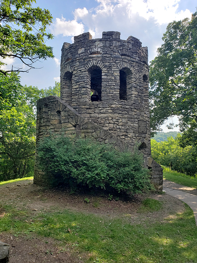 Clark Tower rises from the woodland like a medieval sentinel, an unexpected fairy tale castle in the heart of Iowa's rolling hills.