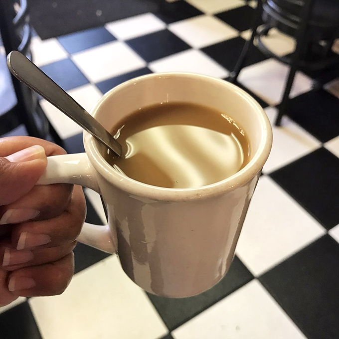 The humble coffee mug &ndash; holding liquid motivation that's been fueling Sunbury conversations and workdays since before smartphones existed.