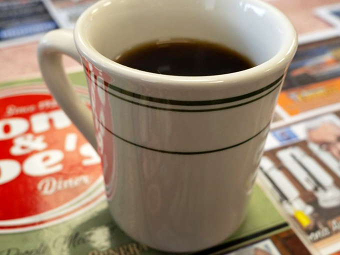 The humble diner coffee mug—delivering caffeine without pretension since forever. No foam art needed when the coffee actually tastes this good.