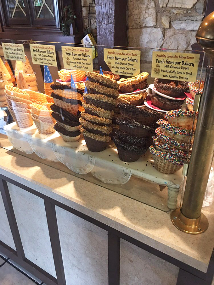 Chocolate-dipped waffle cones standing at attention like delicious soldiers, each one prepared to sacrifice itself for your happiness.