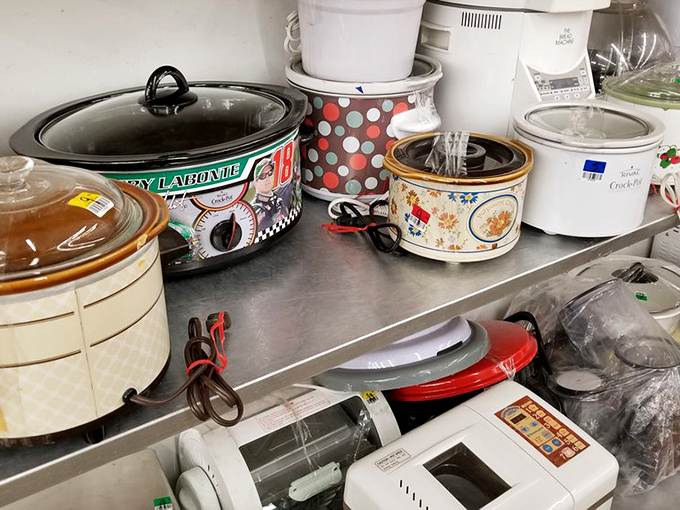 A battalion of slow cookers stands ready for deployment. Someone's abandoned kitchen dreams become your culinary future for pocket change.