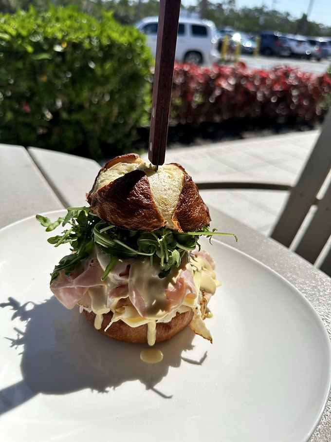 Whoever invented the pretzel roll sandwich deserves a Nobel Prize. The arugula adds that "I'm being healthy" illusion we all need.