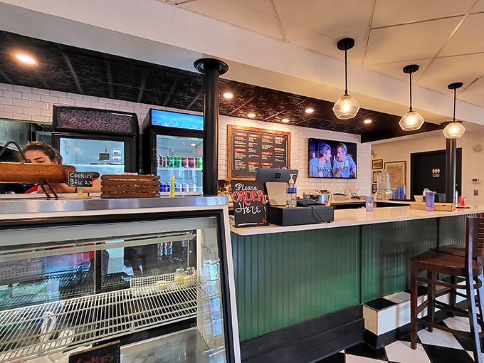 Where pizza magic happens. That green counter has witnessed more joy than most therapists' offices.