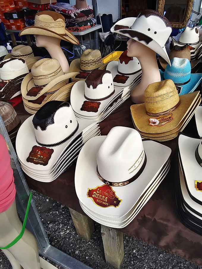 Cowboy hats stand at attention like a Western welcoming committee, each one promising to transform its wearer into the hero of their own story.