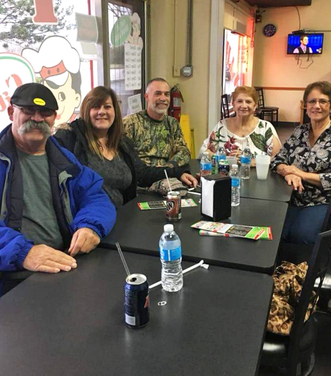 The true measure of a neighborhood joint: tables filled with regulars who've been coming so long they're practically part of the furniture.