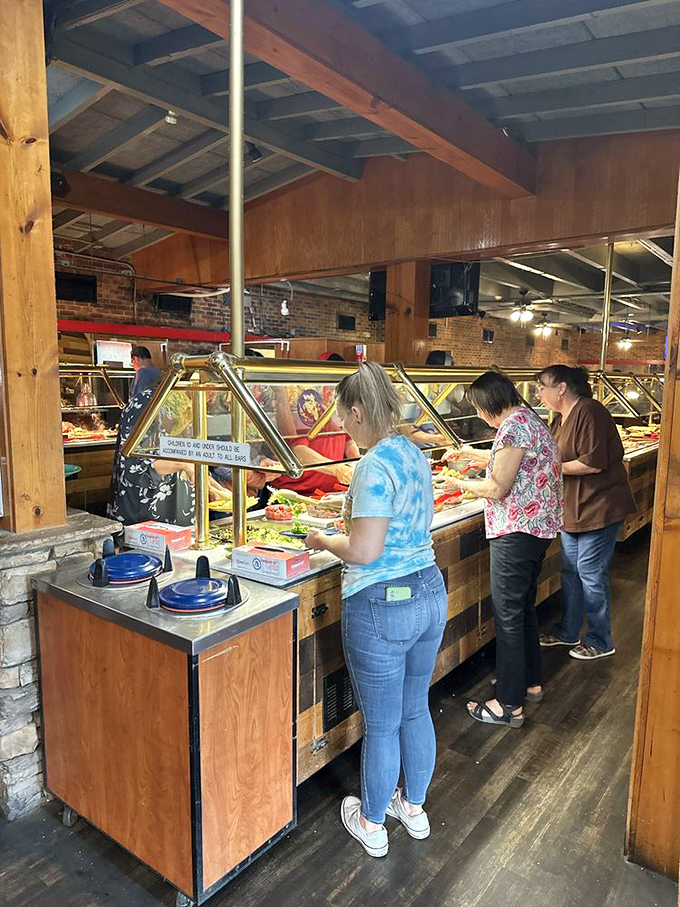 Patrons navigate the buffet with the focused determination of treasure hunters who've found the X on their map. Everyone's on a delicious mission.