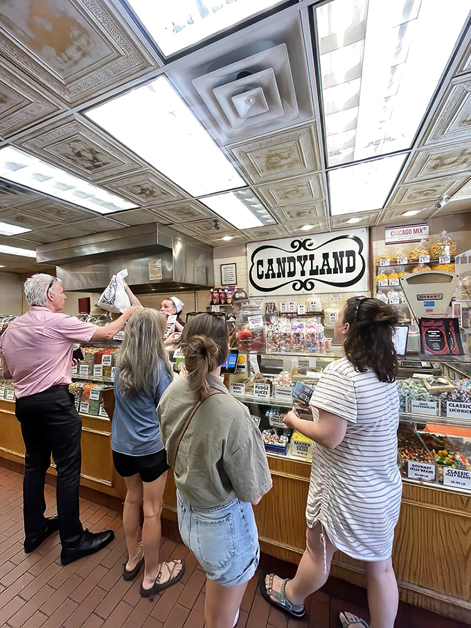 Customers of all ages experiencing that universal moment of candy-induced paralysis &ndash; too many choices, too little stomach capacity.