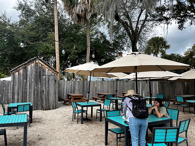 Outdoor dining where Spanish moss and sunshine create the perfect backdrop for contemplating whether to order seconds or save room for dessert.