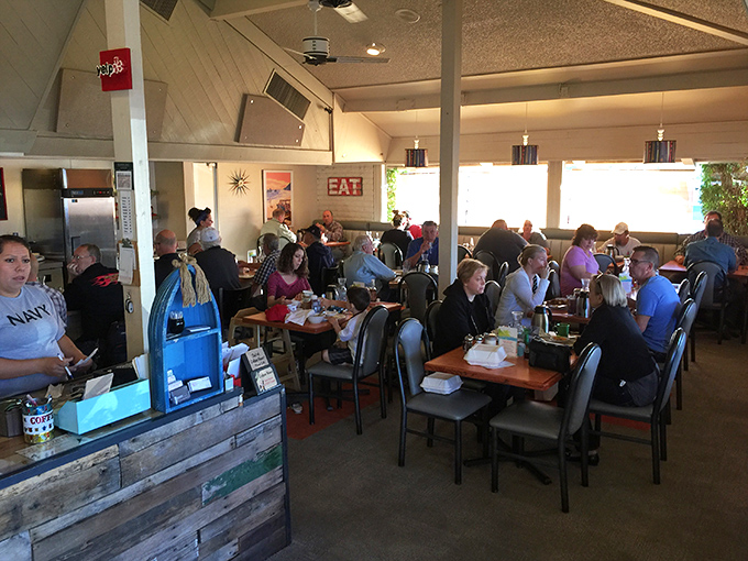 Where strangers become friends over shared breakfast enthusiasm&mdash;notice nobody's looking at their phones when food looks this good.