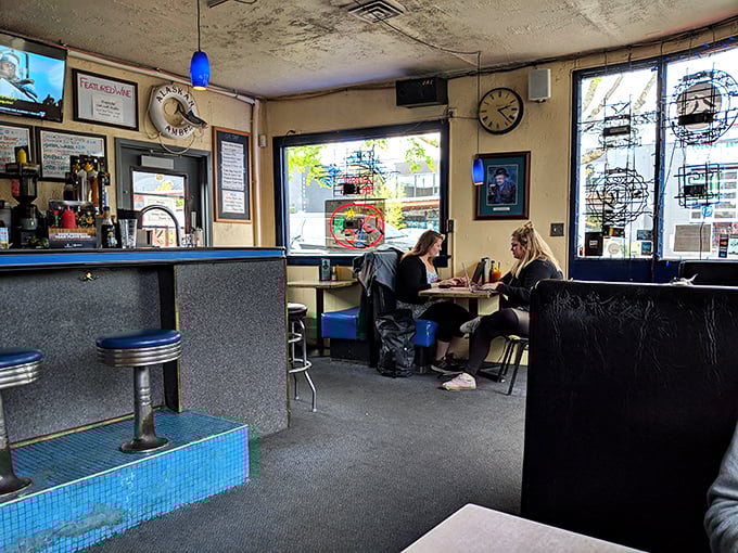 Where strangers become friends over shared tables and fried seafood. The Pacific Inn's dining room is Seattle's great equalizer.