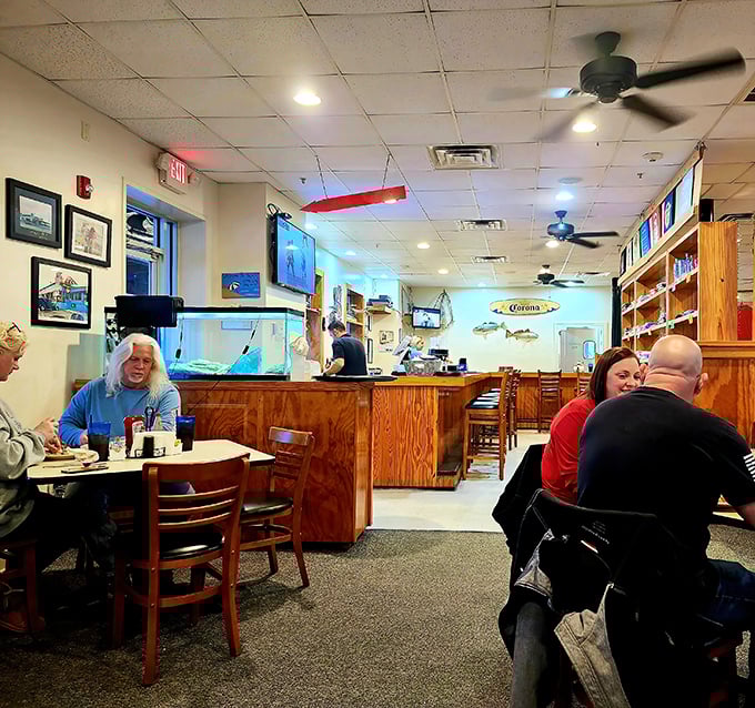 Where locals and tourists unite in the universal language of "mmm" and "pass the hot sauce." Everyone's family when seafood's this good.