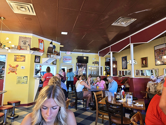 A bustling breakfast scene where strangers become temporary family, united by the universal language of good food.