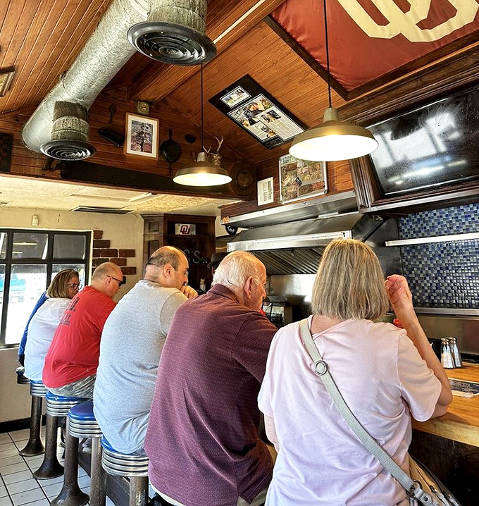 The counter seating isn't just practical&mdash;it's communal. Strangers become friends when united by the pursuit of burger bliss.