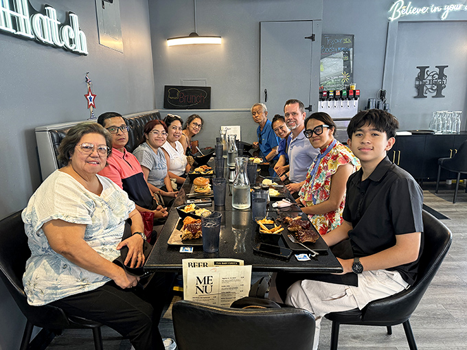Nothing says "food worth traveling for" like a table of happy diners comparing plates and plotting their next visit before finishing the current meal.