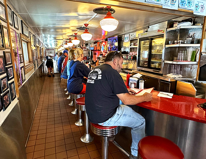 Where strangers become friends over shared appreciation of diner magic. The red counter has heard more stories than a bartender on New Year's Eve.