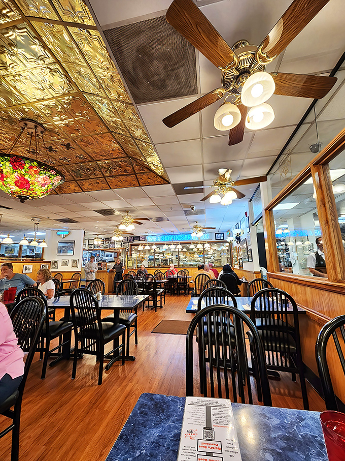 Harold's dining room buzzes with the energy of people united in a common mission: figuring out how to tackle sandwiches taller than some children.