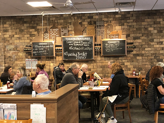 The bustling dining room at lunchtime &ndash; a symphony of conversation, clattering plates, and the occasional "oooh" as towering sandwiches arrive at tables.