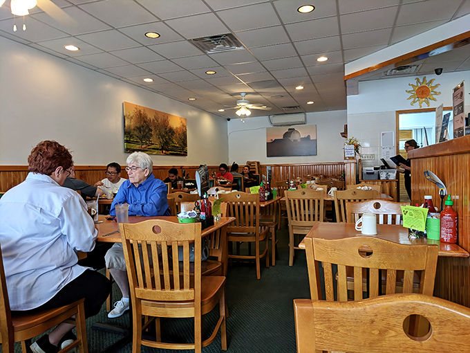 The dining room hums with the universal language of satisfaction—forks meeting plates and coffee cups being perpetually refilled.