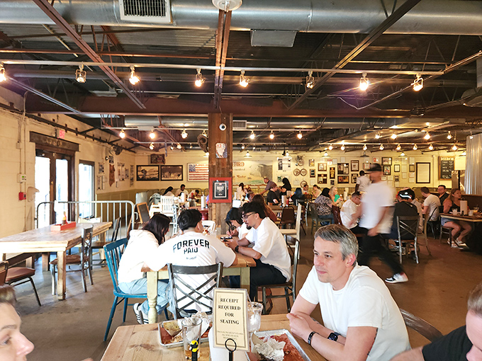 Strangers become temporary family at these tables, united by the universal language of "Did you try the brisket yet?"