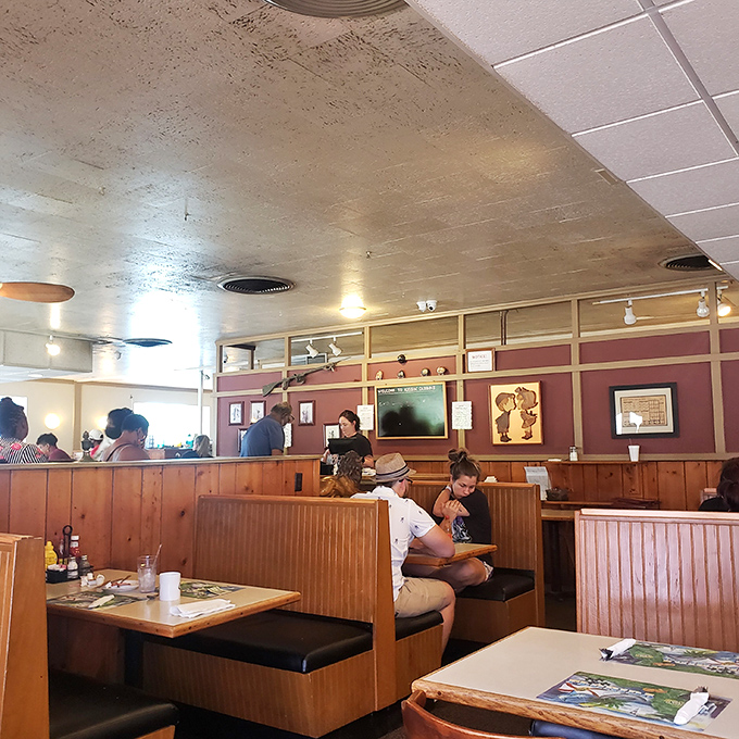 Classic wooden booths where breakfast dreams come true and diet plans go to die – in the most delicious way possible.