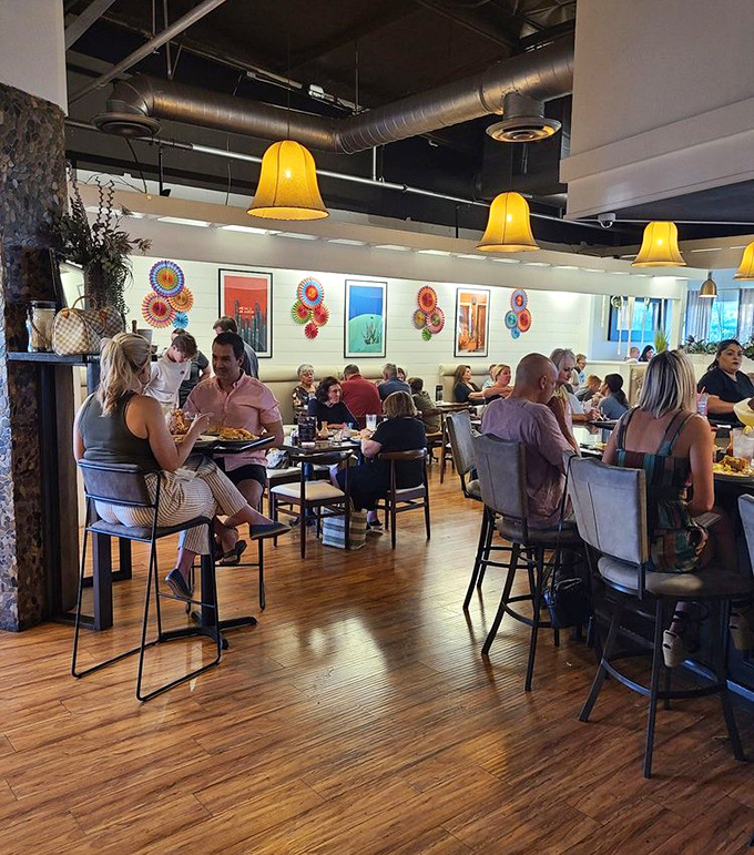 Where strangers become friends over shared plates and colorful wall art, proving that good Mexican food brings people together better than any social network.