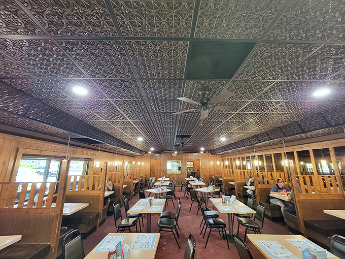 The ornate tin ceiling watches over diners who've come for one thing: honest food that delivers on its promises without pretense.